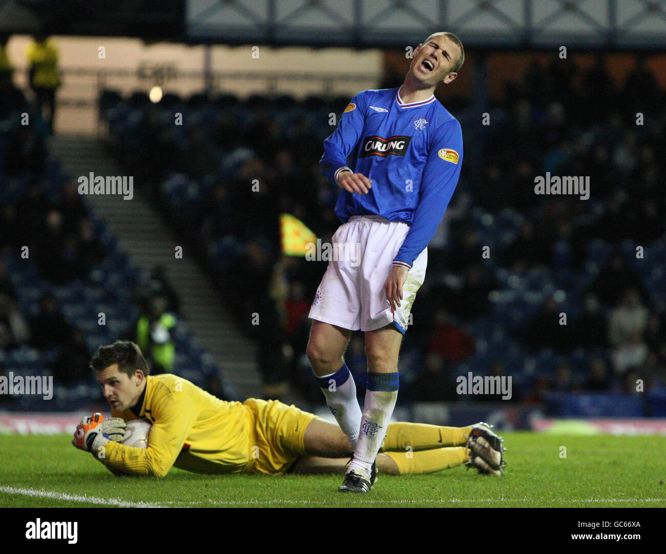 Rangers' Kenny Miller (stood) shows his dejection after a missed chance ...