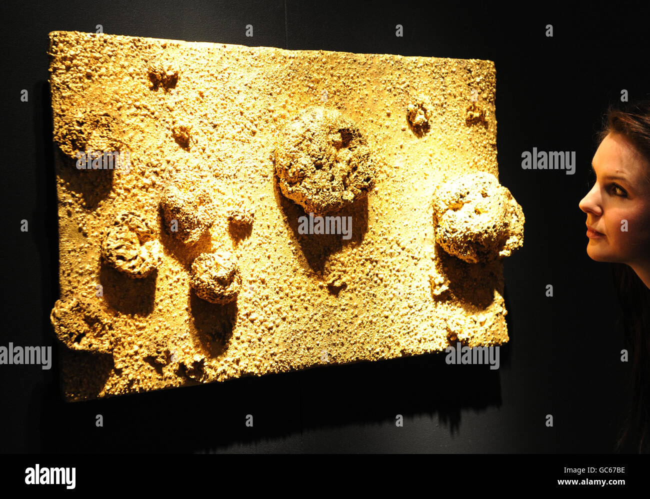 Gold Sponge Relief by Yves Klein on view at Christies in London, and ...
