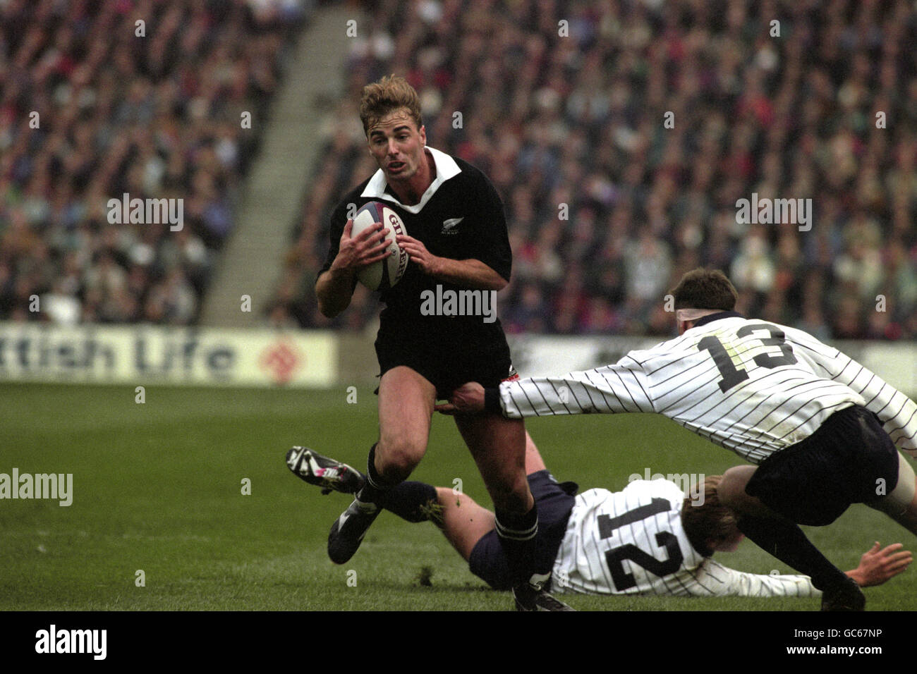 NEW ZEALAND ALL BLACKS' MATT COOPER RUSHES THROUGH SCOTLAND'S DEFENCE ...