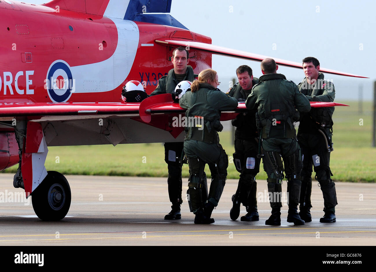 LEFT to RIGHT Red Arrows team Flt Lt Dave Davies, Flt Lt Kirsty Moore ...