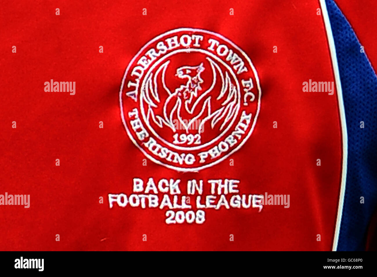 Detail of the Aldershot club badge with "Back in the Football League ...