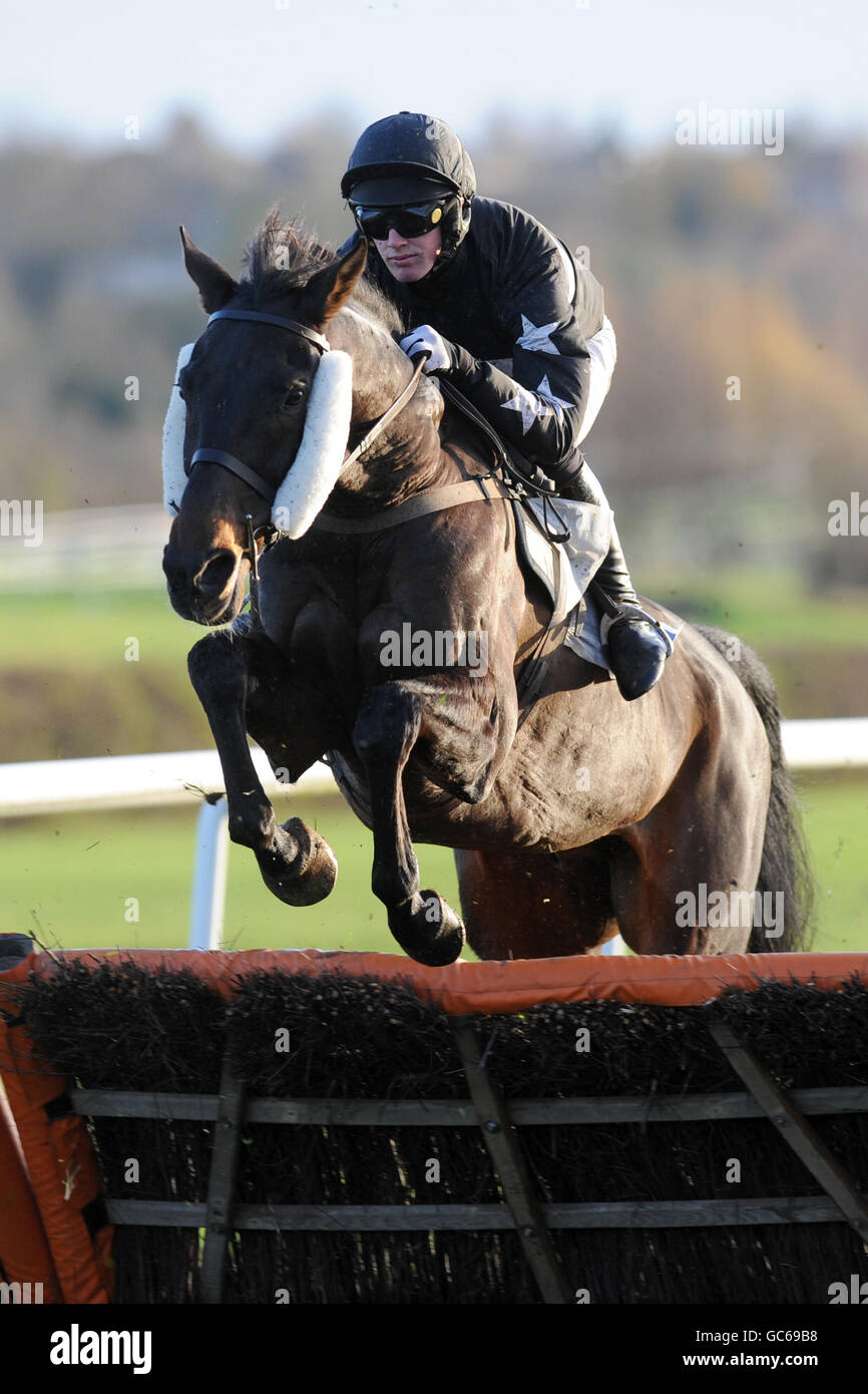 Horse racing races full length fence hurdle hi-res stock photography ...
