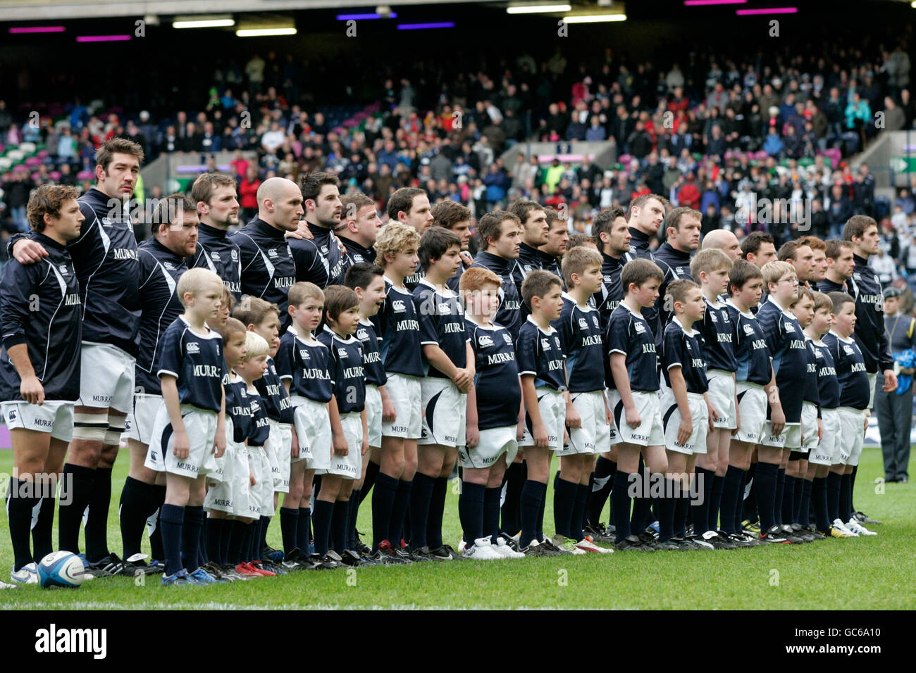 Scotland players mascots on the pitch prior to kick off hi-res stock ...