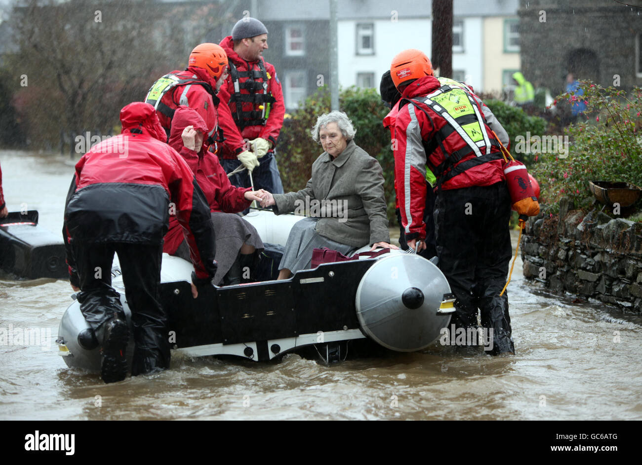 Mountain rescue workers help residents as roads in Keswick, Cumbria ...