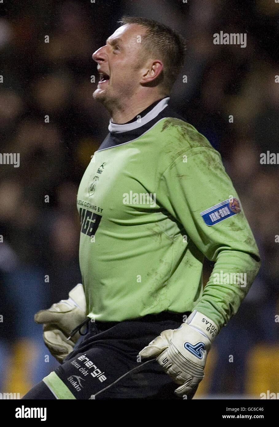 Dundee goalkeeper Rab Douglas reacts as his side score the winning goal ...