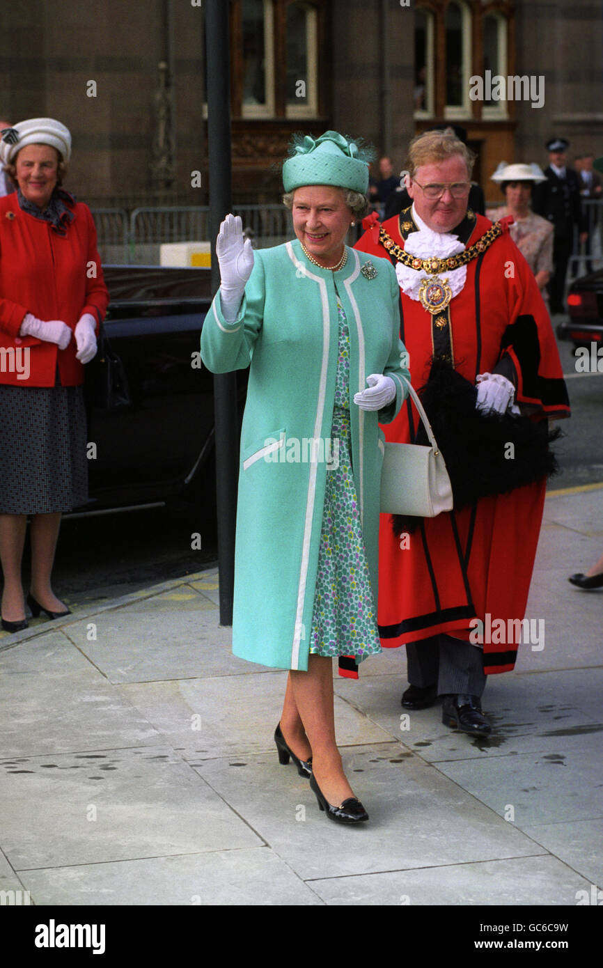 The queen visits manchester to open the new metrolink tram system. hi ...