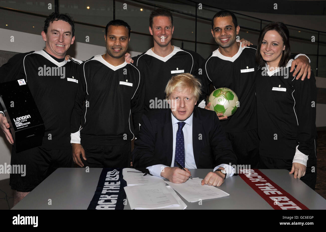 London Mayor Boris Johnson (bottom centre) signing the official host ...