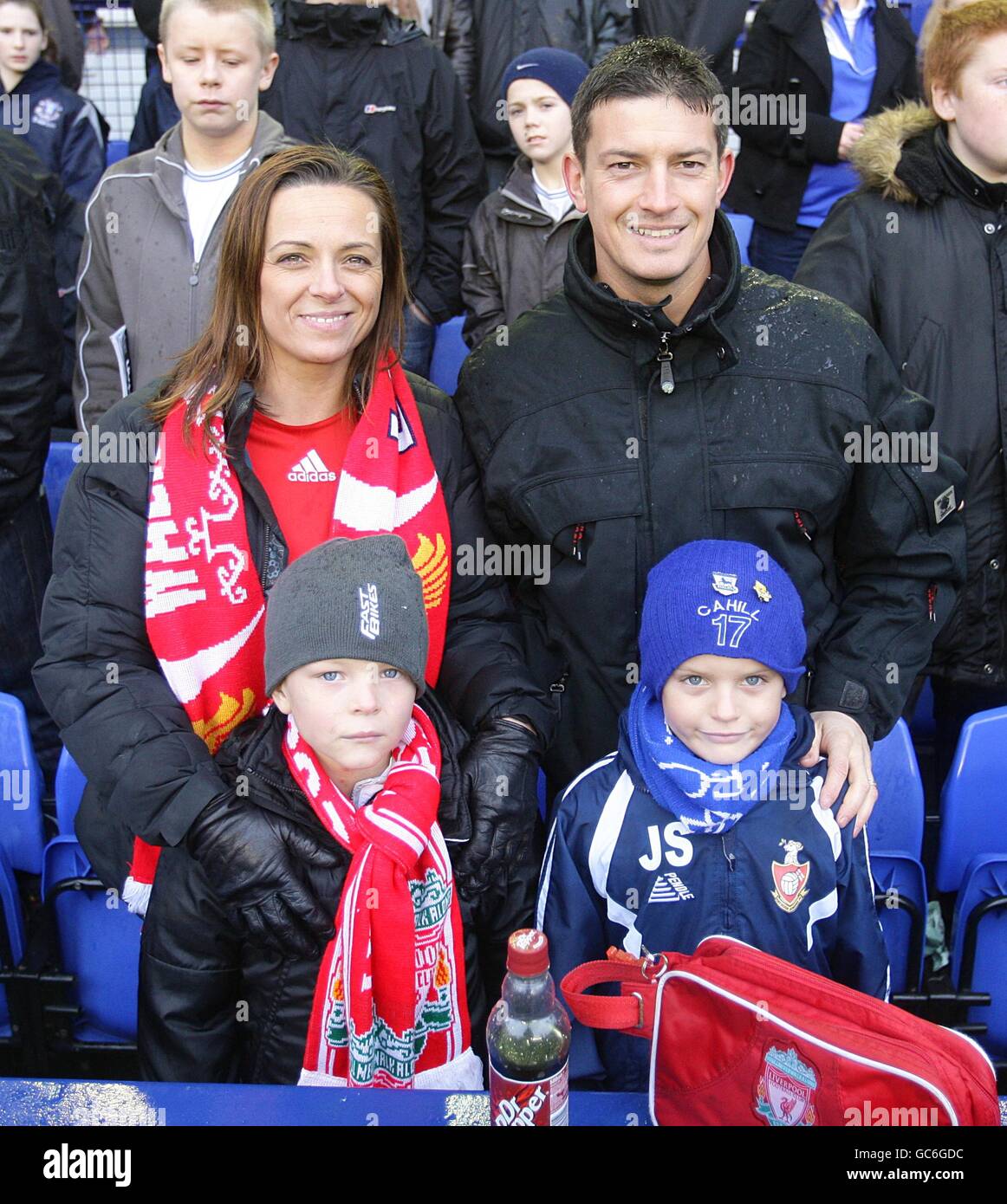 A family of everton liverpool fans in stands hi-res stock photography ...