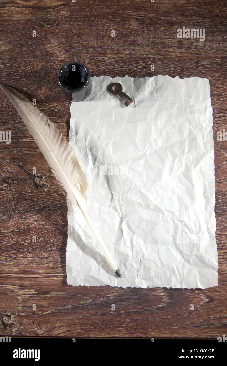 Paper and quill pen. Vintage items for writing Stock Photo - Alamy