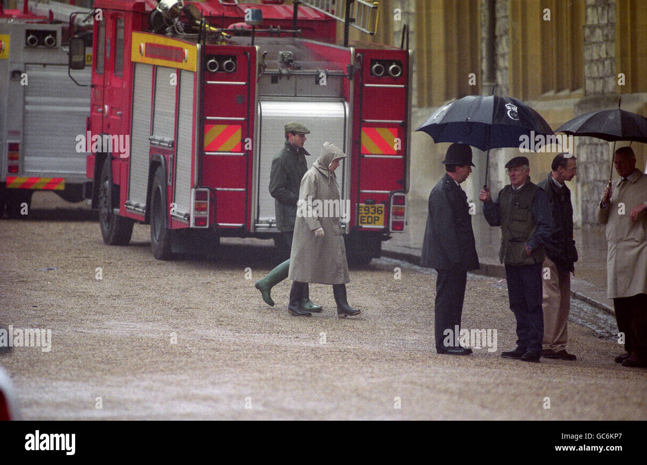 Queen Elizabeth II surveys the scene at Windsor Castle with Prince ...
