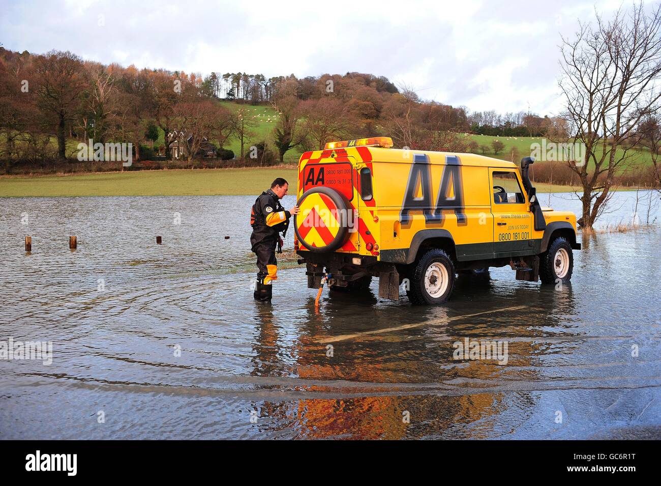 The AA rescue a car near Cockermouth, Cumbria as floods submerge large ...