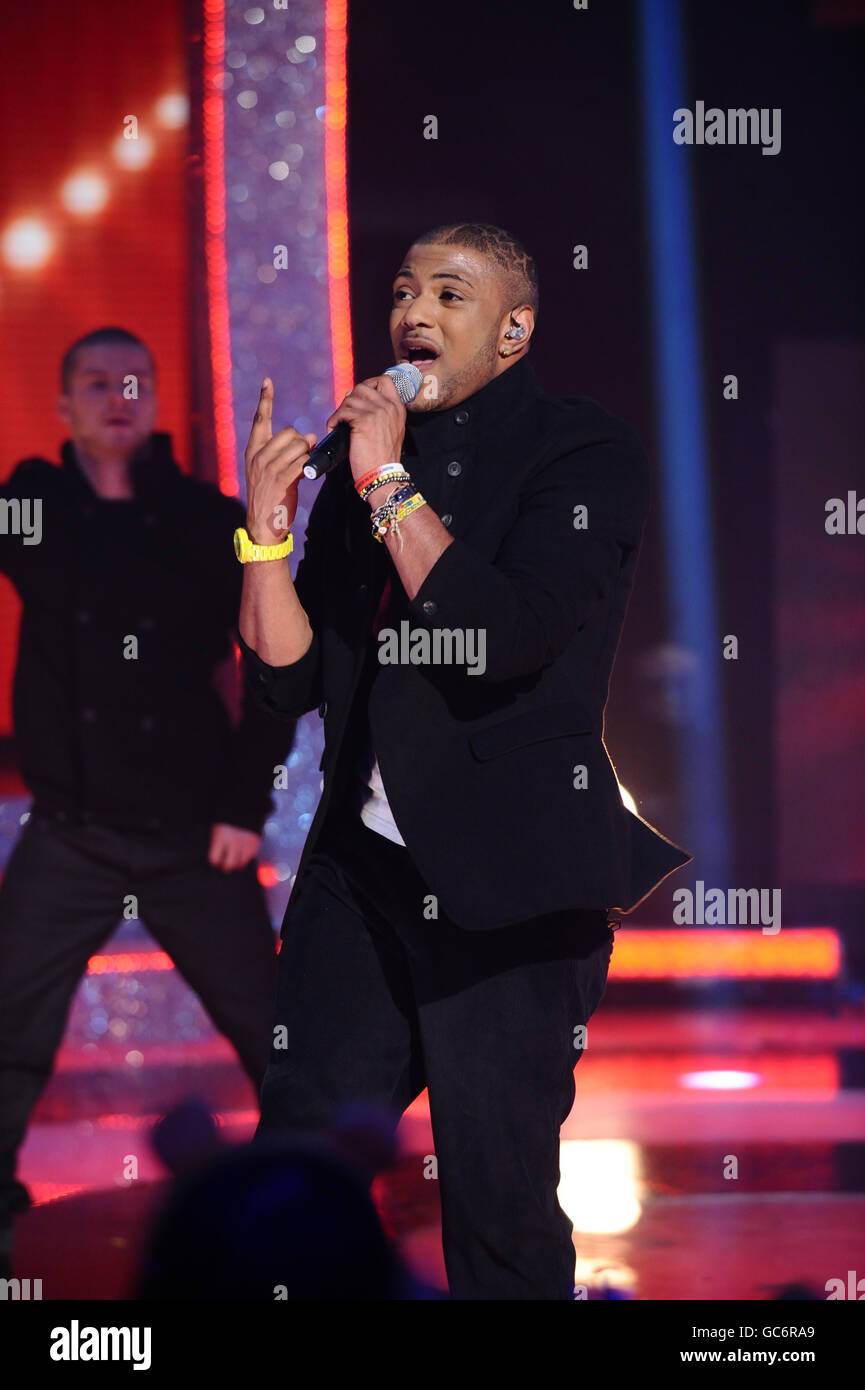 EDITORIAL USE ONLY. JLS member Jonathan Benton performing at the ...