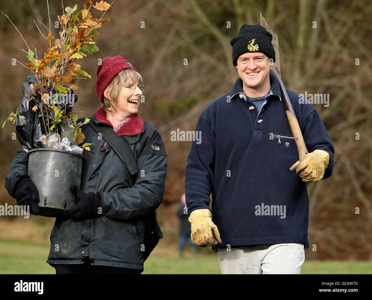 Gill Constable and Marcus Lambert prepare to plant one of the first ...