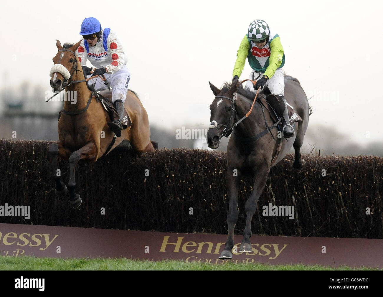 Denman and Ruby Walsh (right) take the last fence on their way to ...