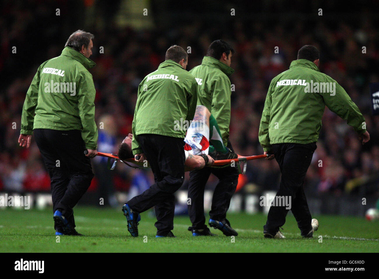 Injured stretchered off hi-res stock photography and images - Alamy