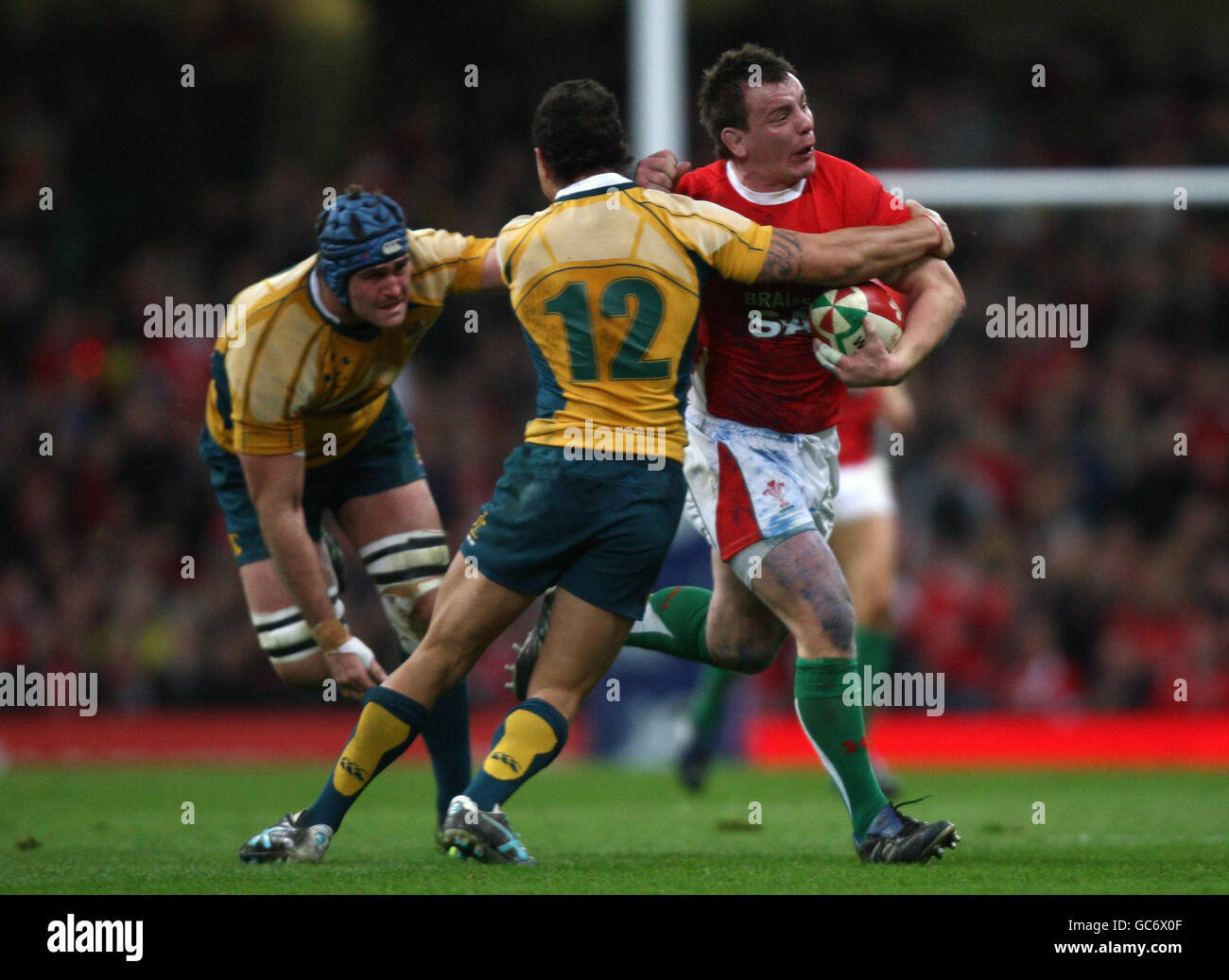Wales' Matthew Rees is tackled by Australia's Quade Cooper during the ...