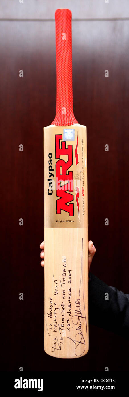 A signed cricket bat which was presented to Britain's Queen Elizabeth ...