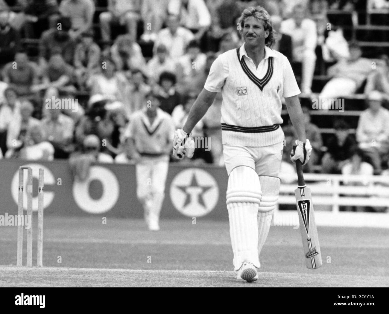 Somerset's Ian Botham leaves the field after losing his wicket Stock ...