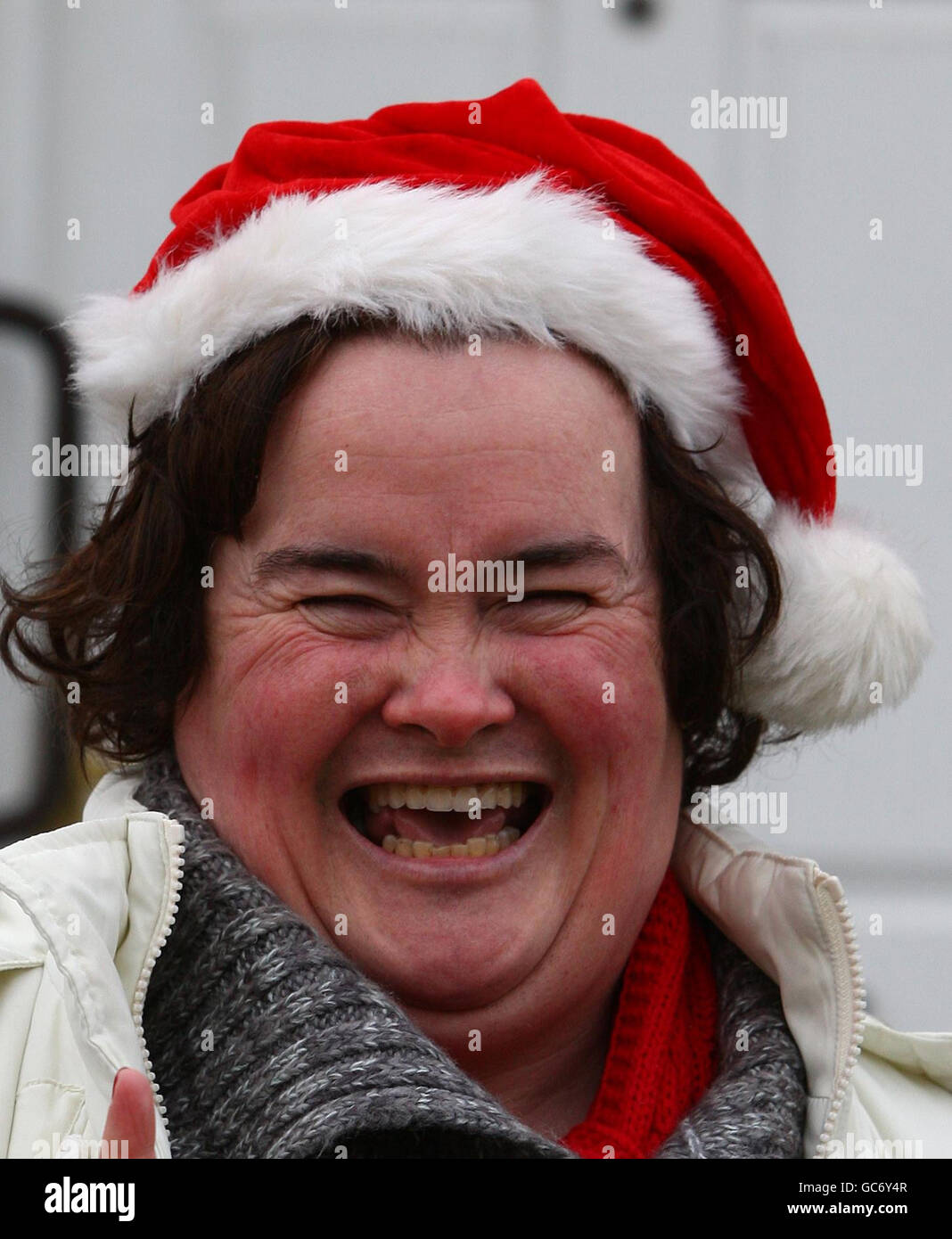Singer Susan Boyle signs her CD outside her home in Blackburn, Scotland ...