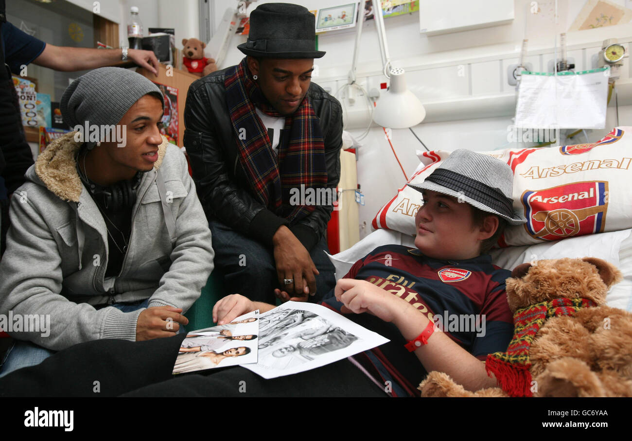 Oritse Williams and Aston Merrygold of JLS meet Frazer Peters, aged 11 ...