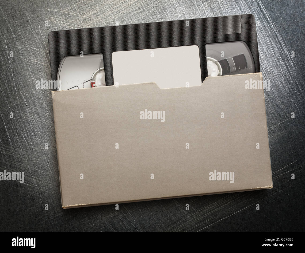 Black video cassette on steel gray background Stock Photo - Alamy