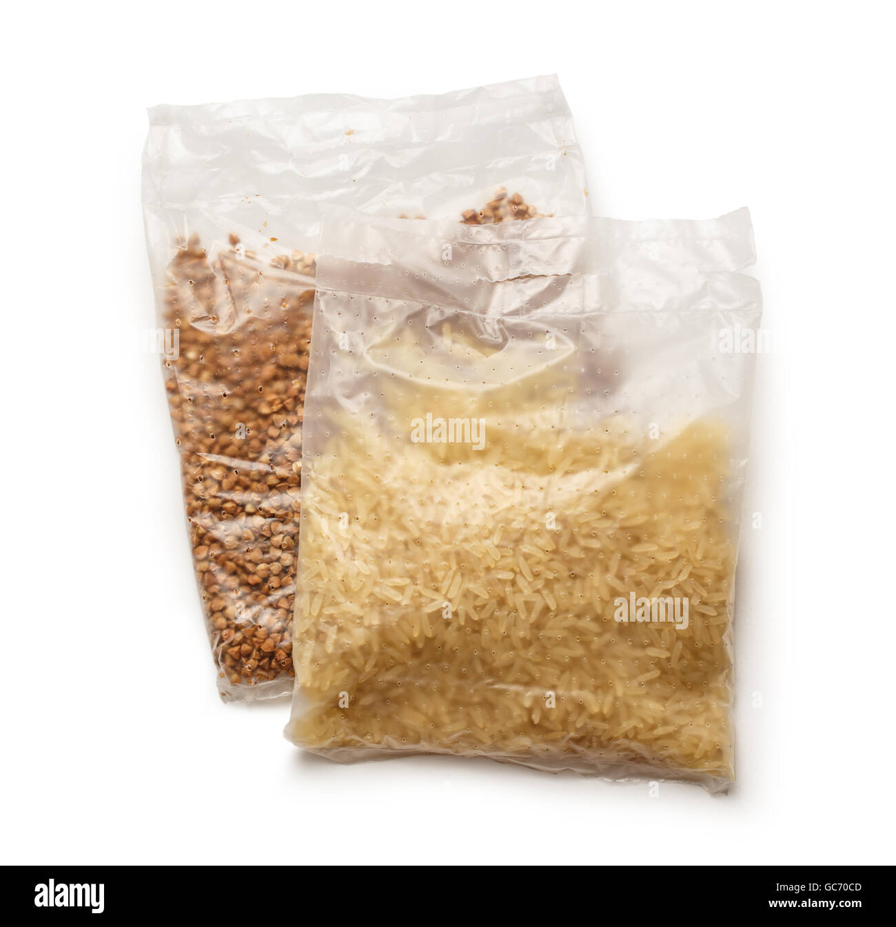 Packets of dry buckwheat and white rice Stock Photo - Alamy