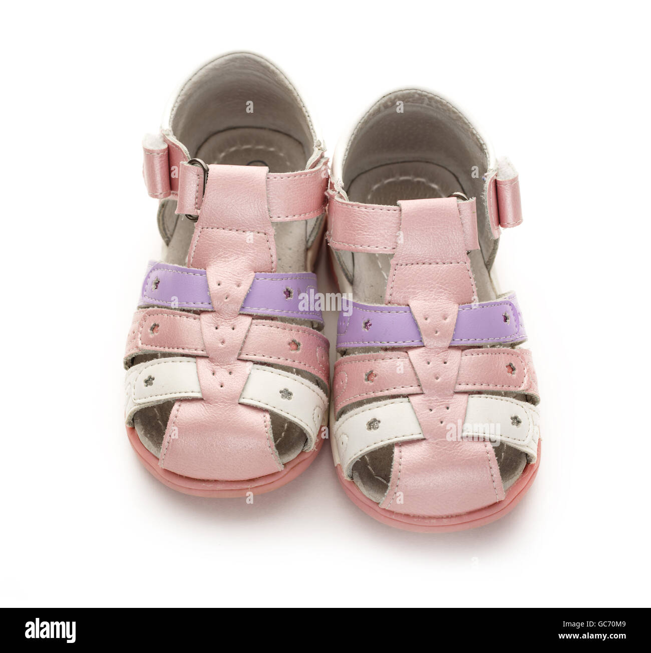 Girl's pink sandals on white background closeup Stock Photo - Alamy