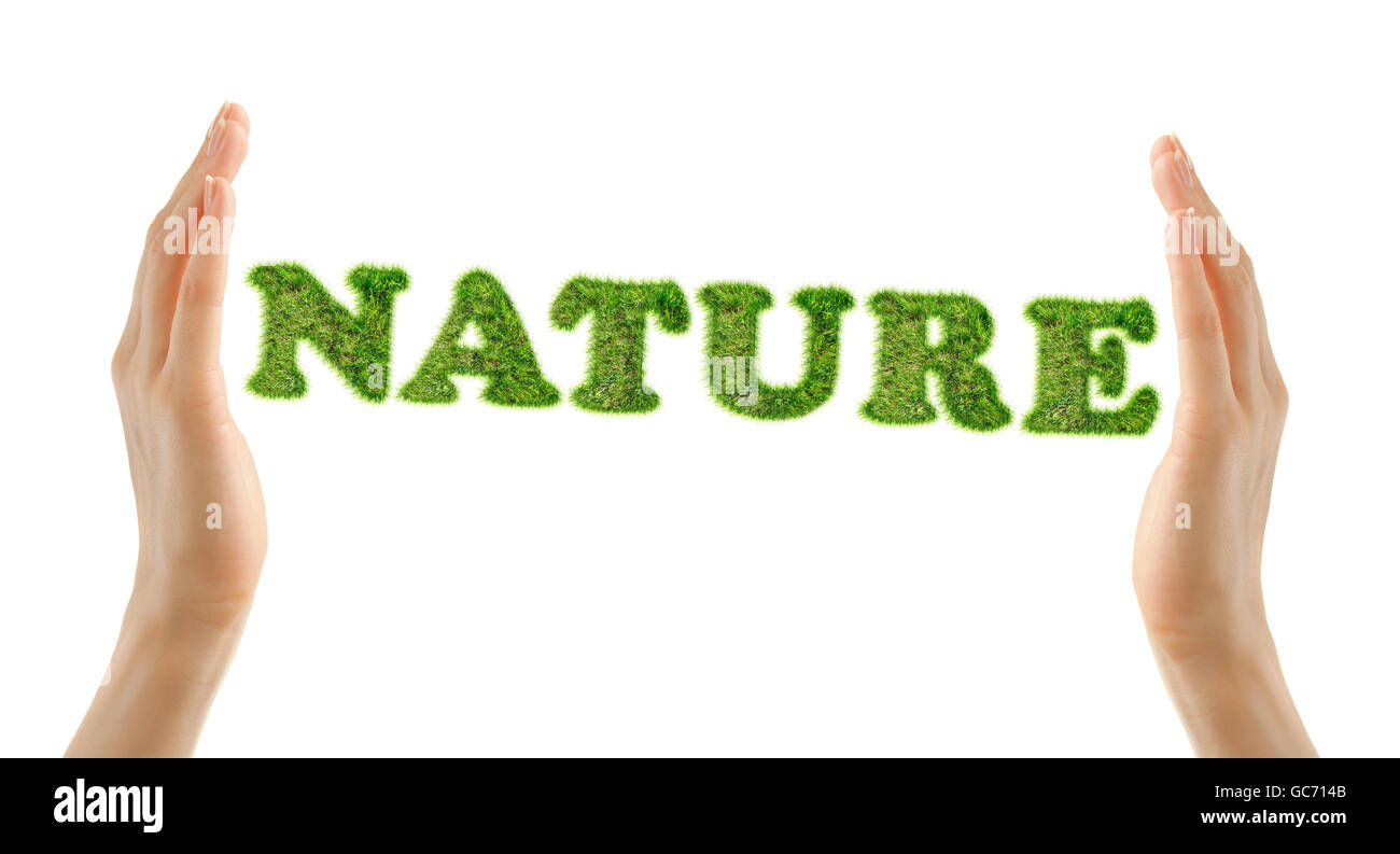Word nature written with grass between female hands Stock Photo - Alamy