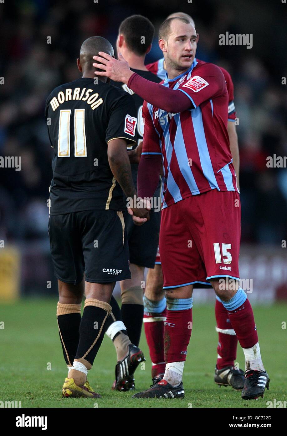 Coventry City's Clinton Morrison (left) is consoled by Scunthorpe ...