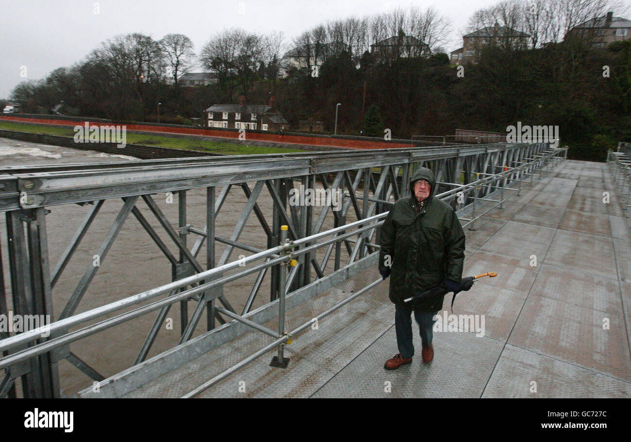 A member of the public walks along Barker Crossing in Workington, a new ...