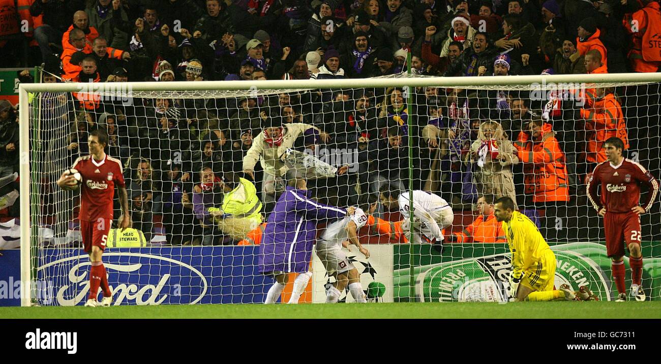Fiorentina's Alberto Gilardino (center behind the goal) celebrates ...