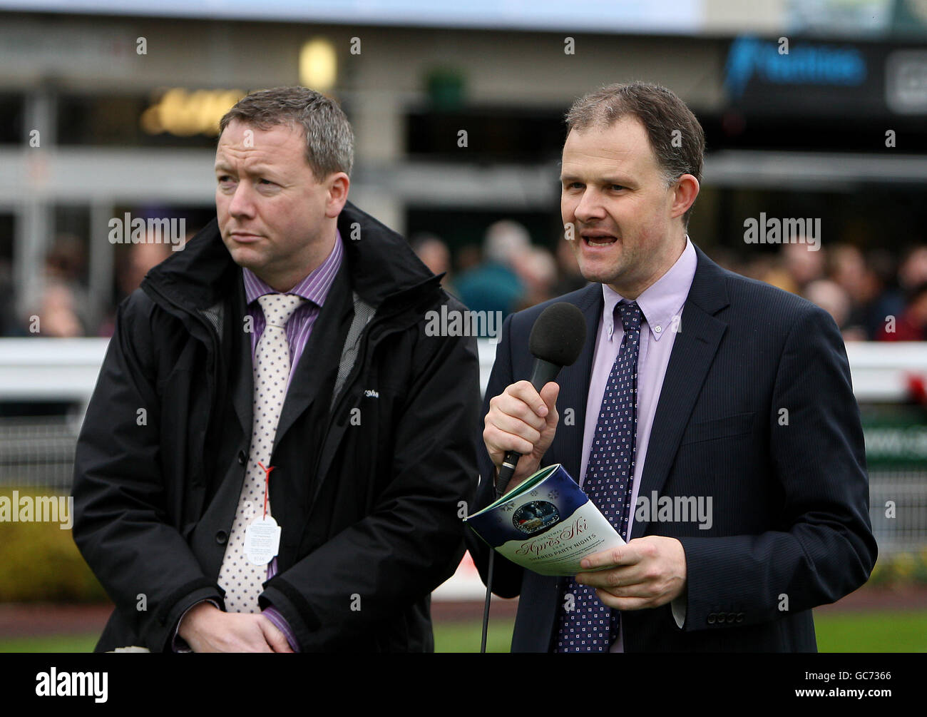 Sandown compere Anthony Kemp (right) does a piece to camera in the ...