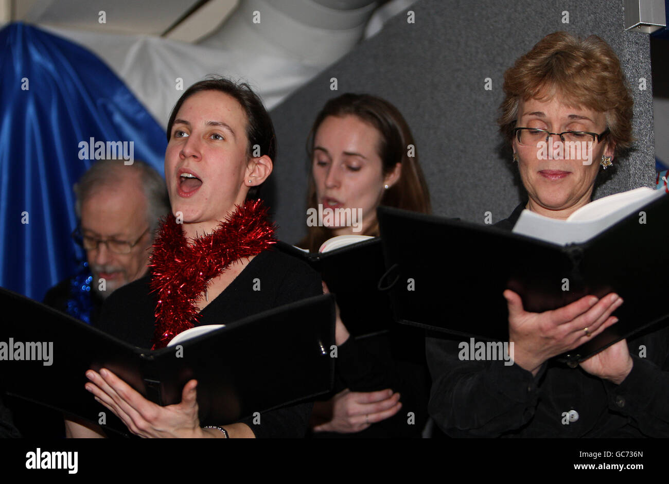 Members of the New London Singers Choir sing in the Esher Hall after ...