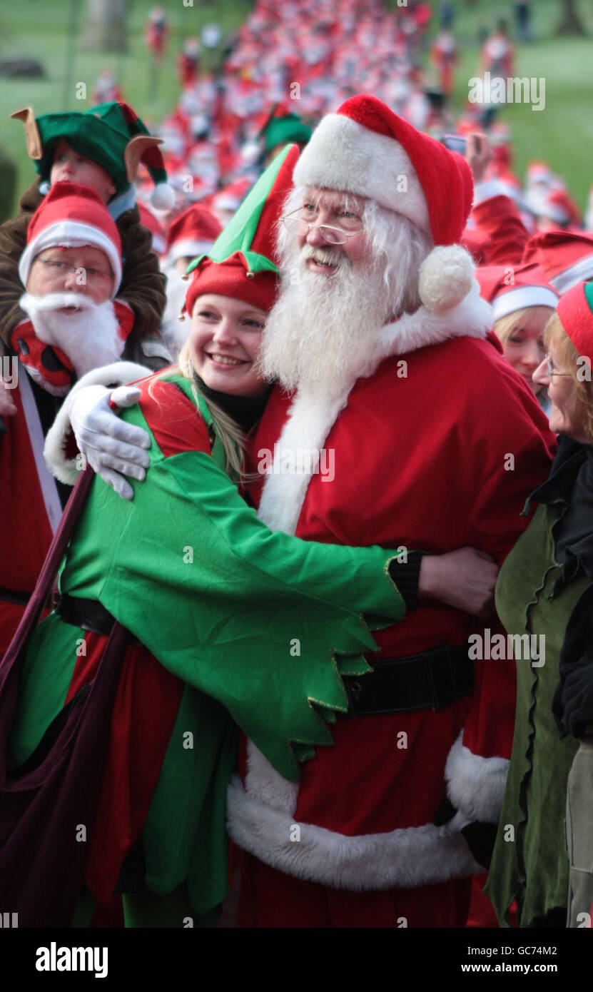 Santas take part in the Great Scottish Santa Run at West Princes Street ...
