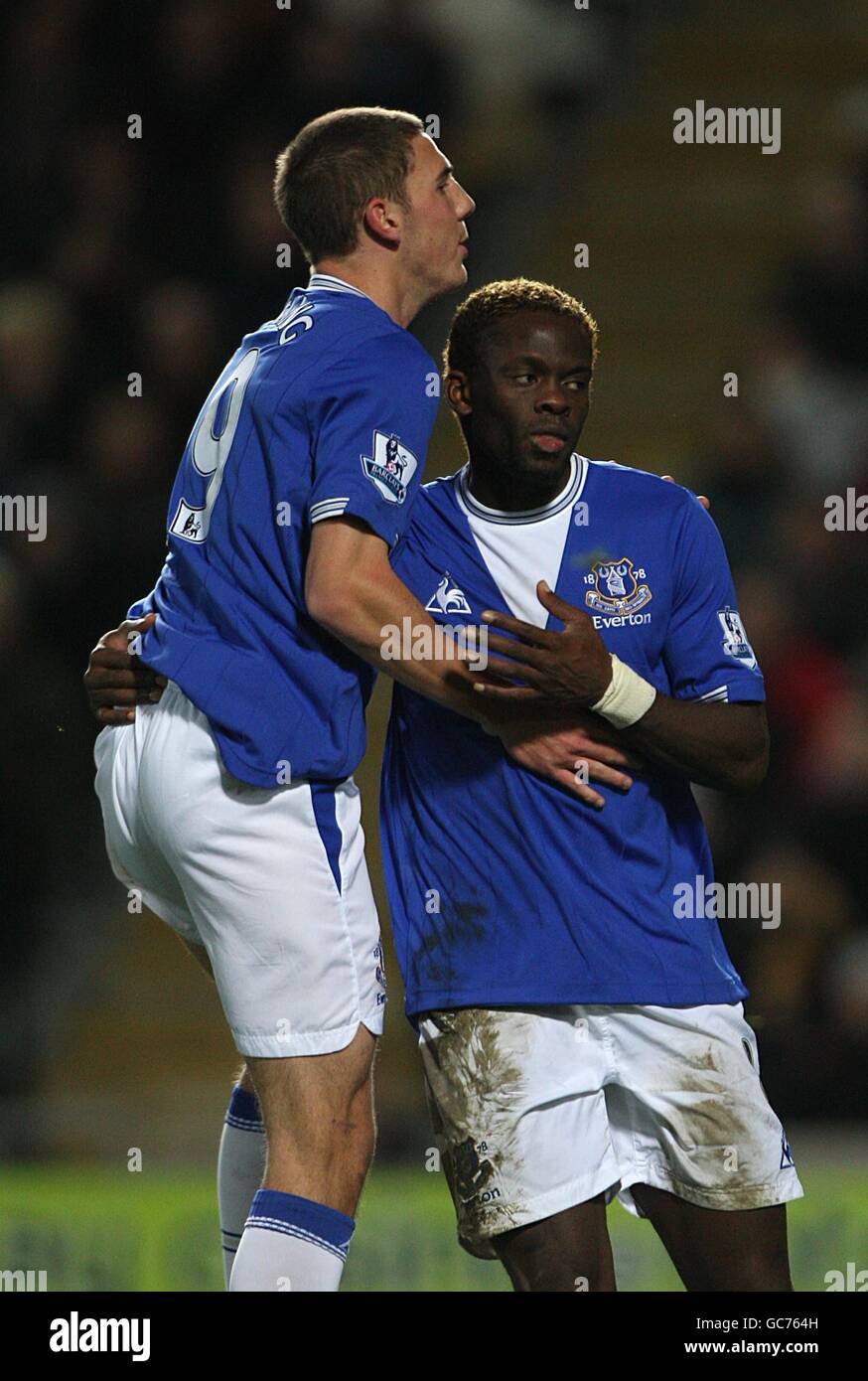 Everton Louis Saha (right) is congratulated by team mate Dan Gosling ...