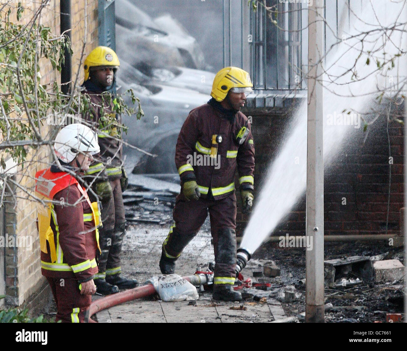 Firefighters at the scene of a fire in Peckham, south east London ...