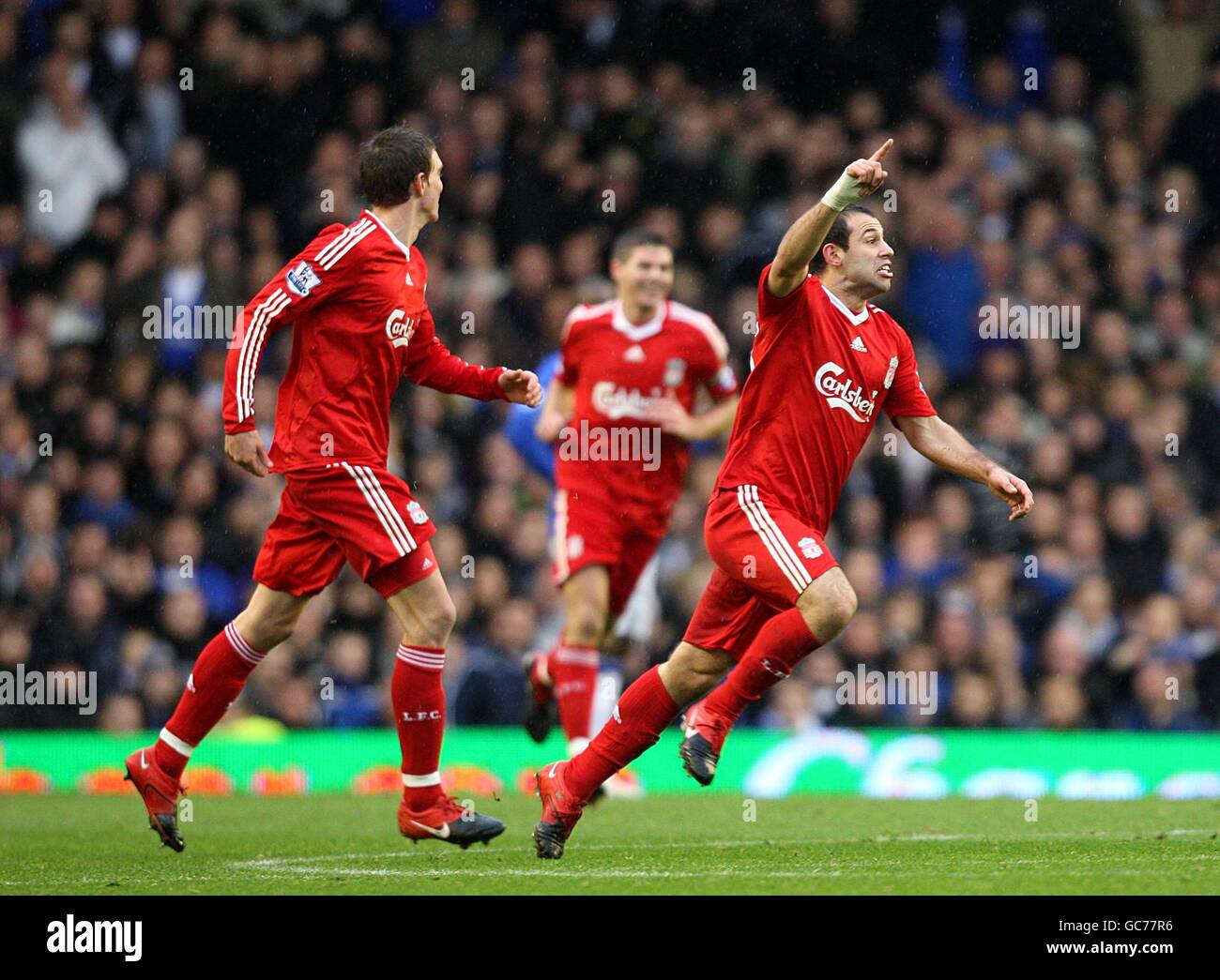 Liverpool's Javier Mascherano (right) celebrates after scoring his ...