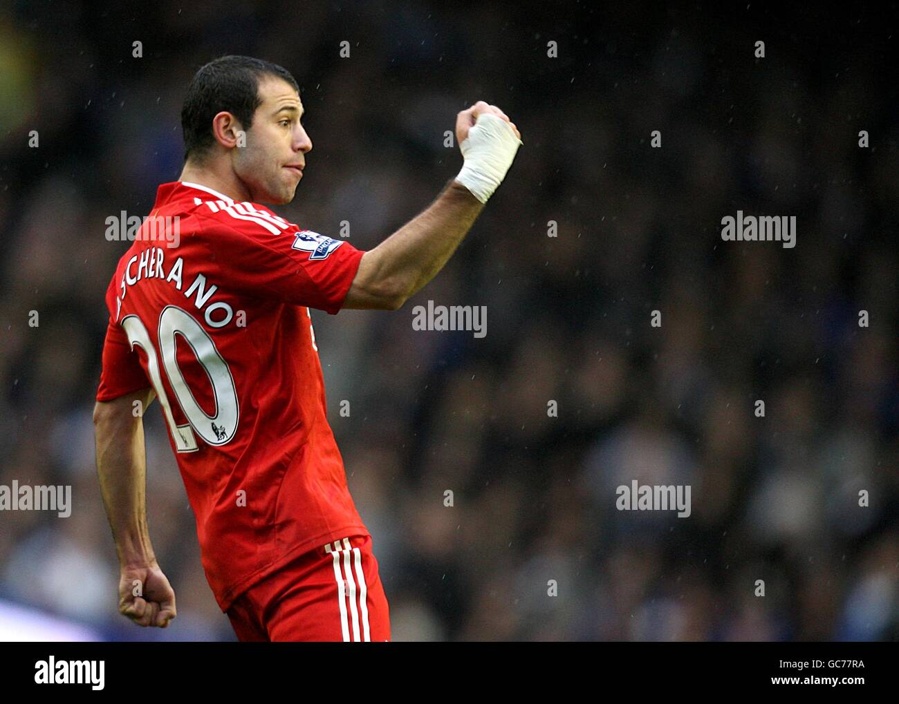 Liverpool's Javier Mascherano celebrates scoring the opening goal of ...
