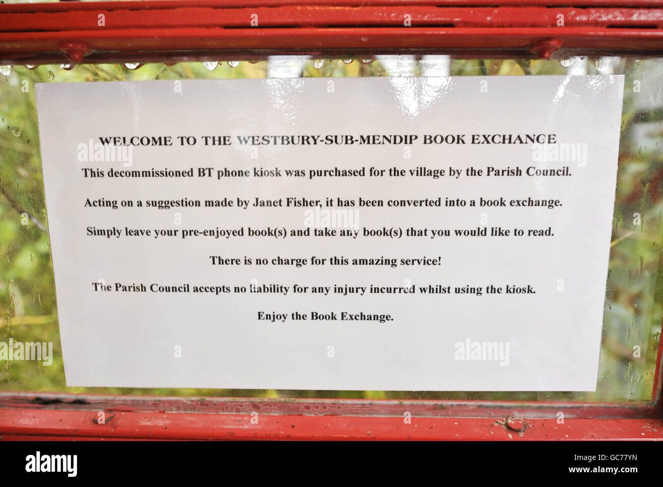A sign inside a red BT telephone box in the Somerset village of ...