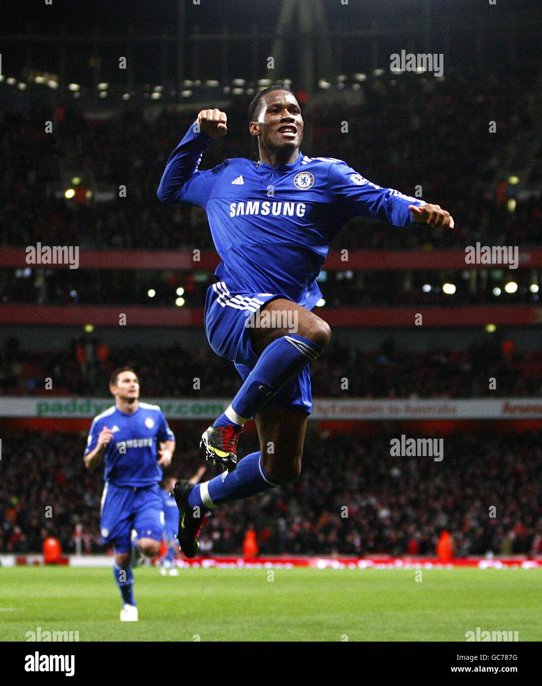 Chelsea's Didier Drogba celebrates scoring his sides third goal of the ...