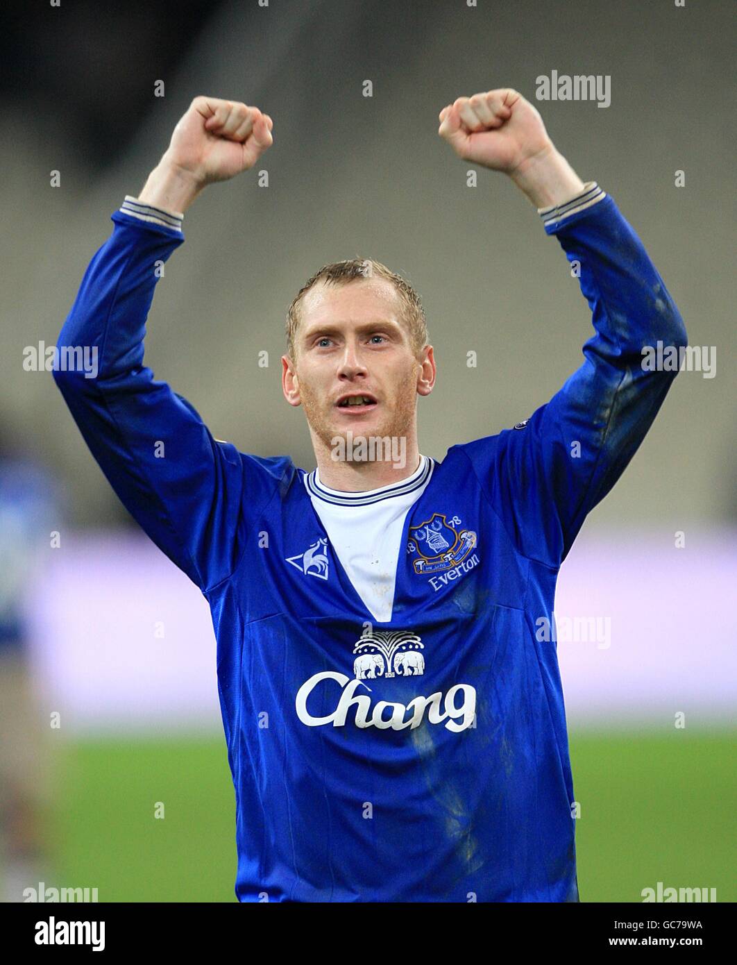 Evertons tony hibbert celebrates at the final whistle hi-res stock ...