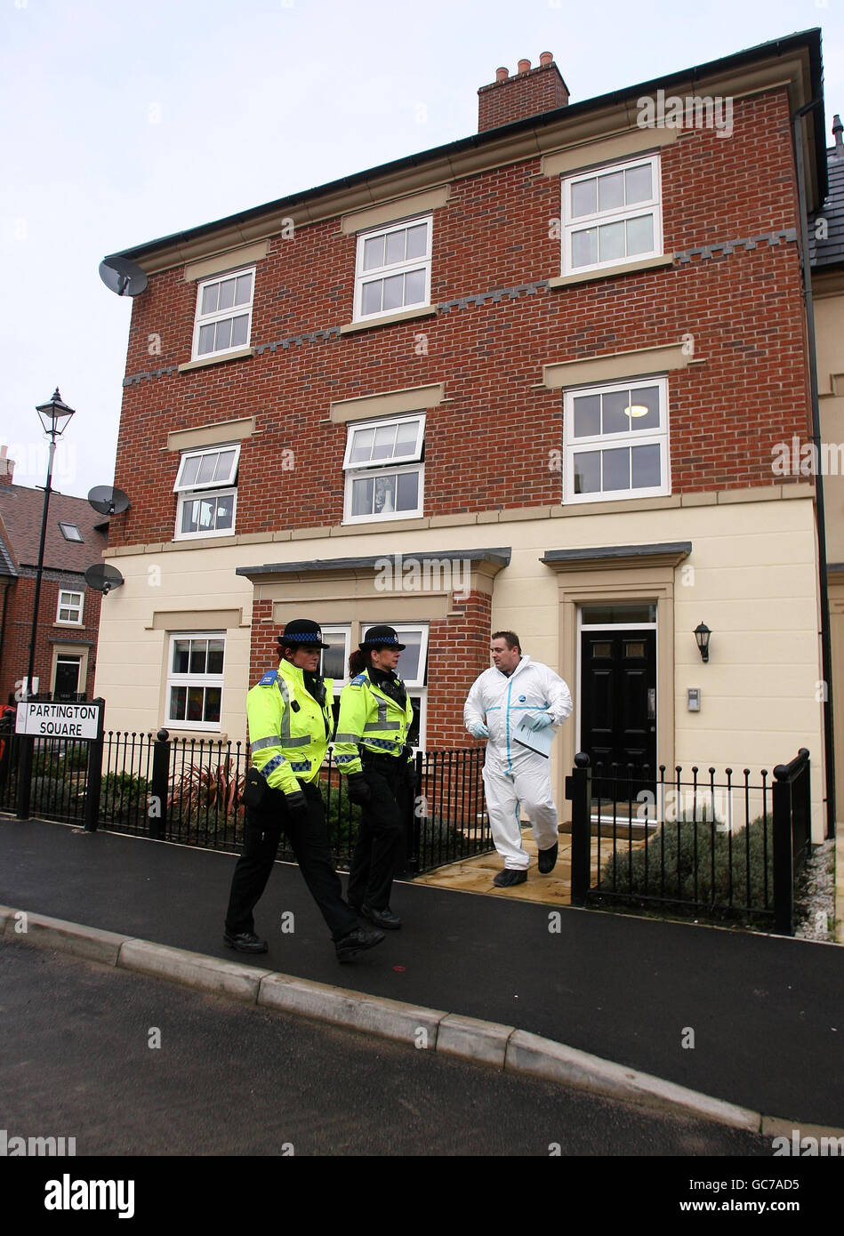Police officers at the murder scene in partington square hi-res stock ...