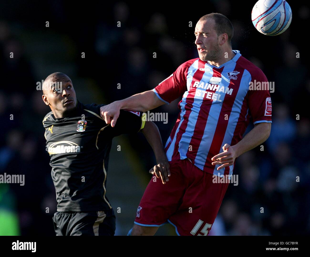 Coventry City's Clinton Morrison (left) and Scunthorpe United's David ...