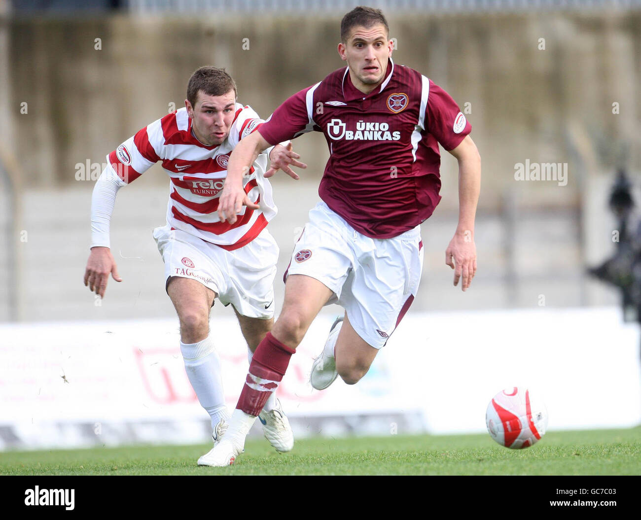 Hamilton's James McArthur and Heart Ismael Bouzid battle for the ball ...