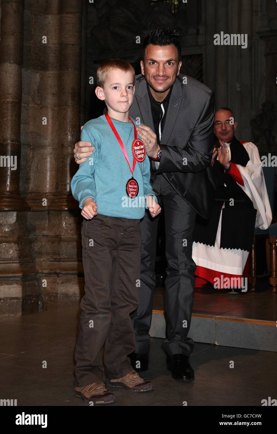 Tom Fryers receives the Achievement award on stage, presented by Peter ...