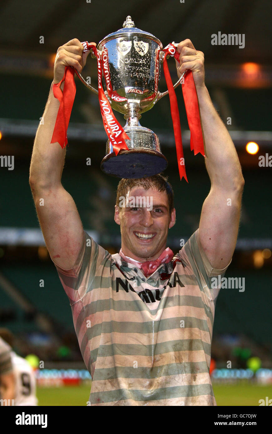 Cambridge captain Dan Vickerman with the trophy after their victory ...