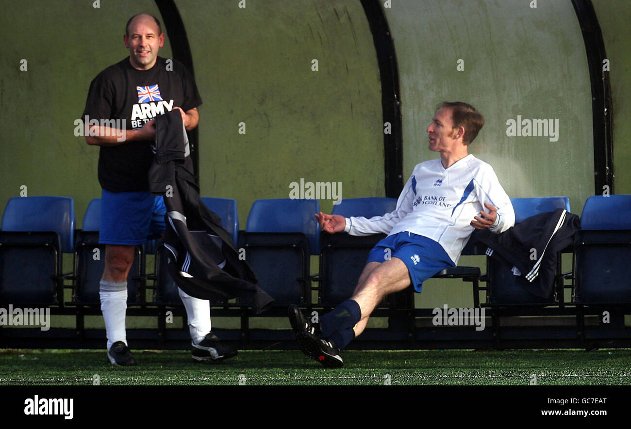 Scottish Secretary Jim Murphy (left) with an unidentified man during a ...
