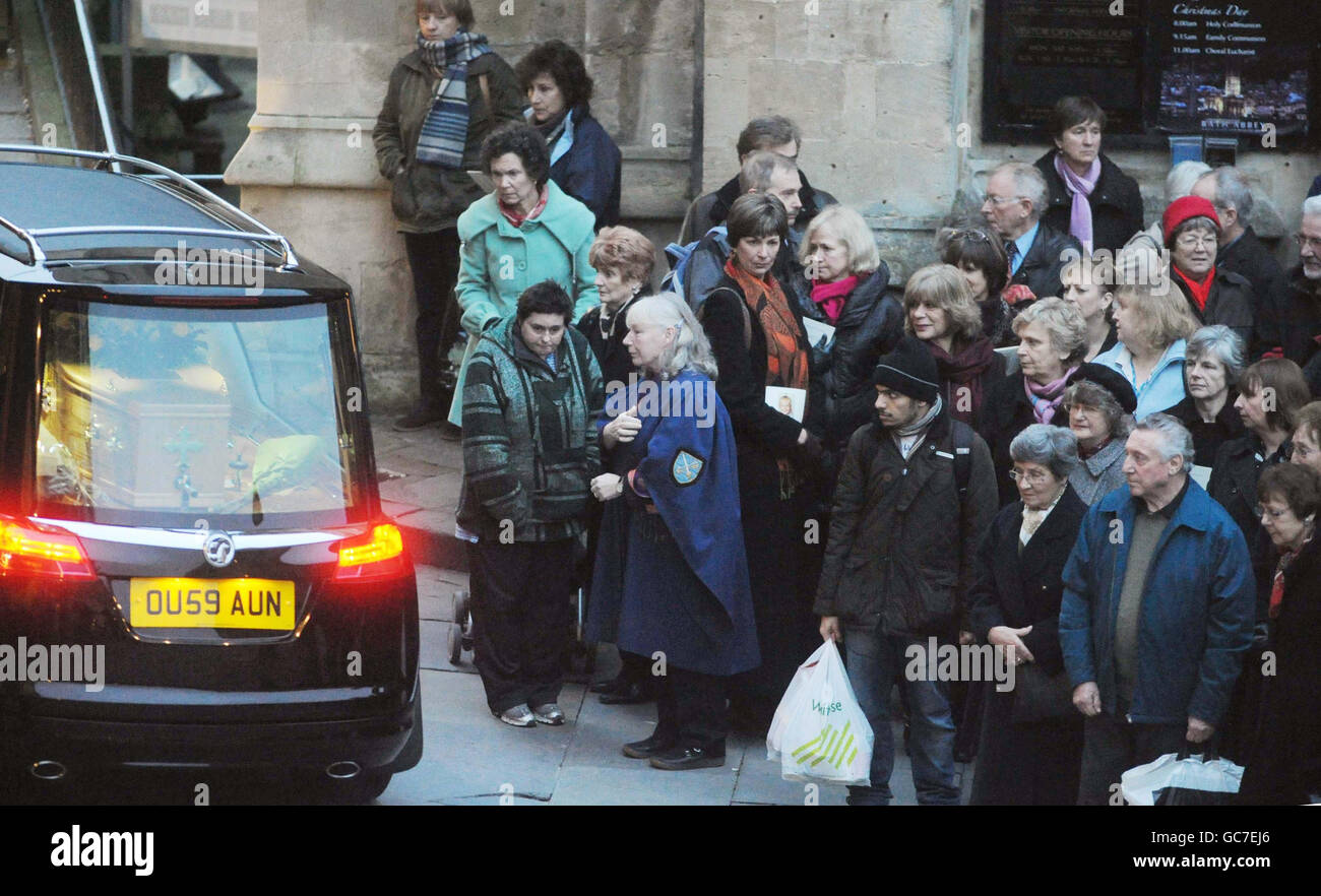 Coffin of Melanie Hall is driven away passing some of the people that ...