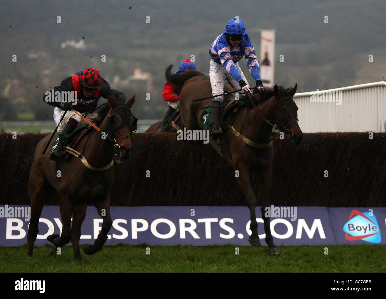 Jockey Charlie Huxley on Sovereign King (left) jumps ahead of Tjade ...