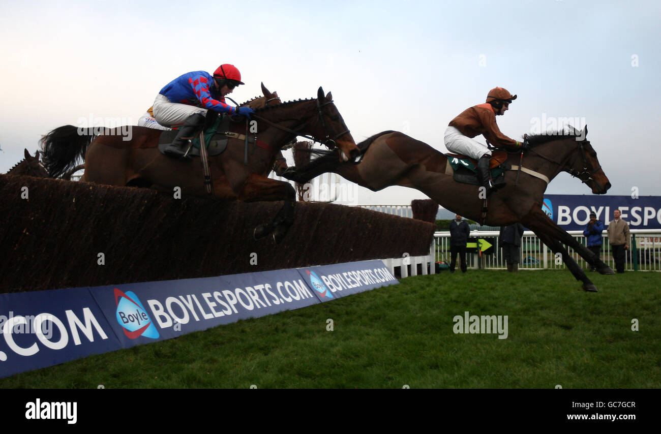 Jockey Nathan Sweeney on River Indus (right) jumps ahead of William ...